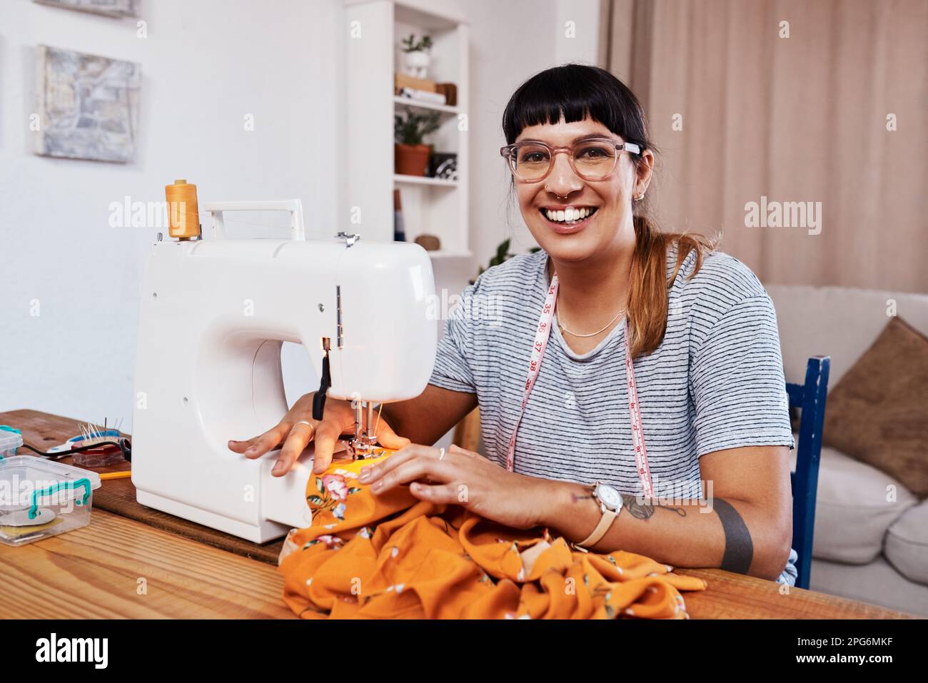 I started making my own clothes from a young age. a young woman ...