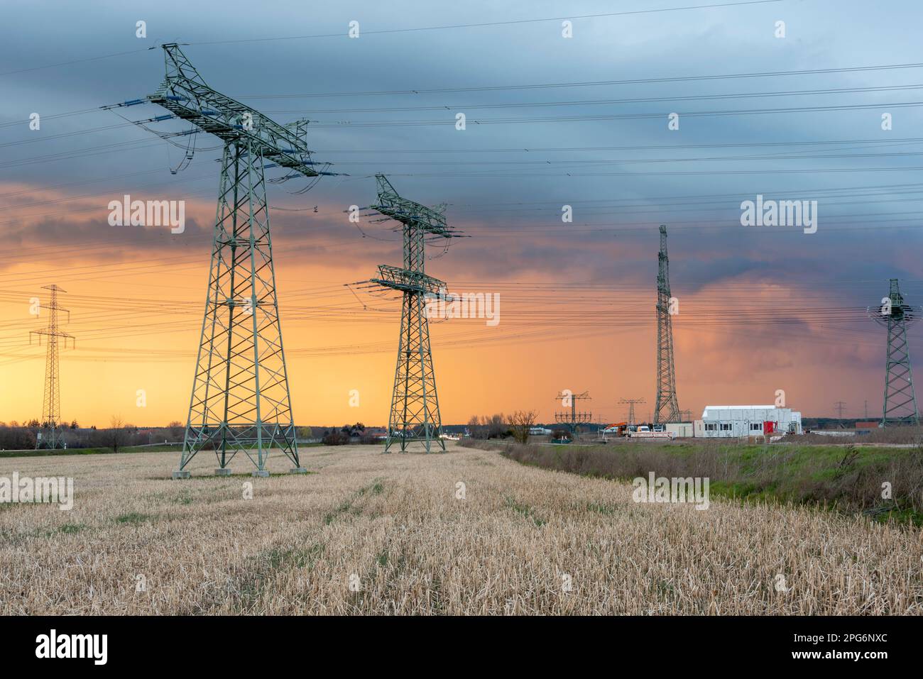 Thunderstorm cell, lightning over construction containers of the ...