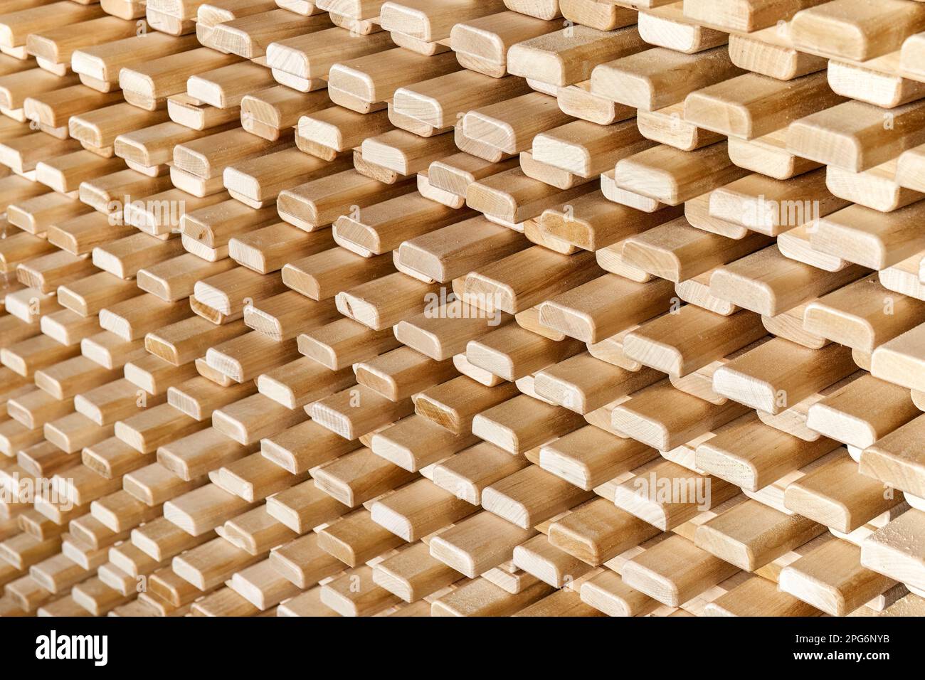 Large stack of new wooden lattices made of natural solid birch in ...