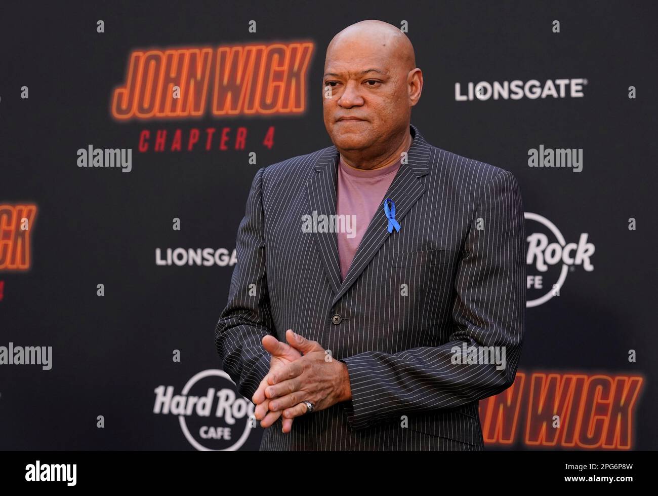 Laurence Fishburne poses at the premiere of the film "John Wick ...