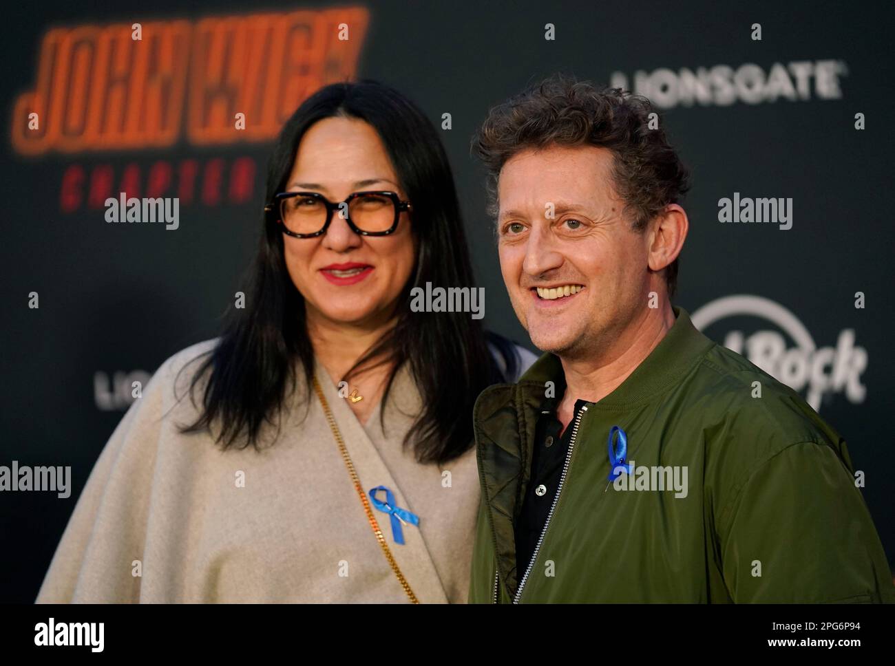 Alex Winter, right, and Ramsey Ann Naito pose together at the premiere ...