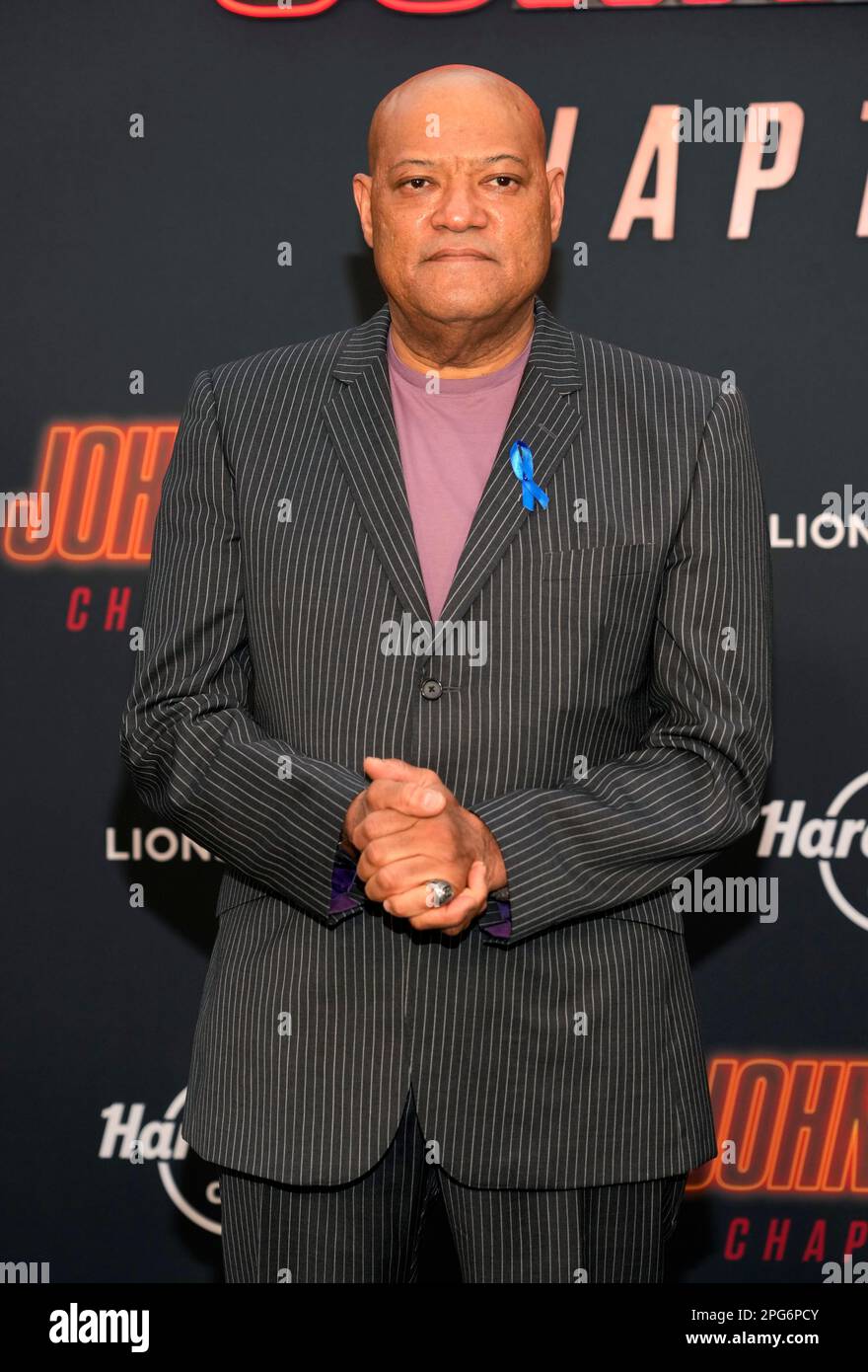 Laurence Fishburne poses at the premiere of the film "John Wick ...