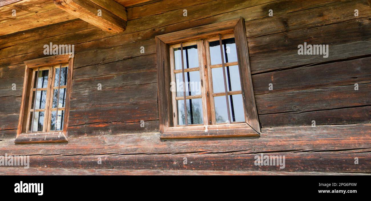 Aged wooden window with glazing and partially weathered in rustic homes ...