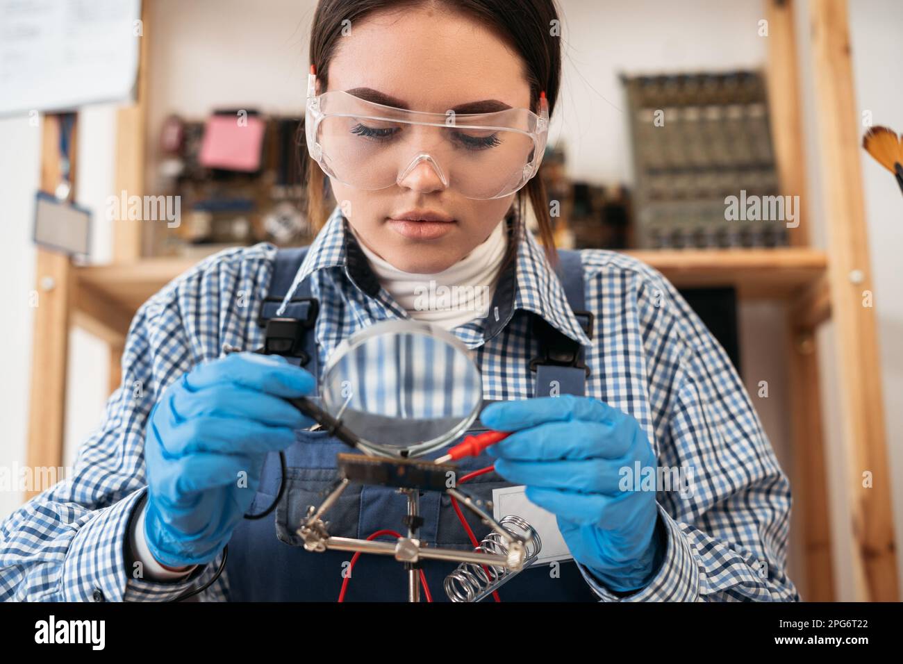 Desktop with broken disassembled laptop. Electronic parts of pc ...