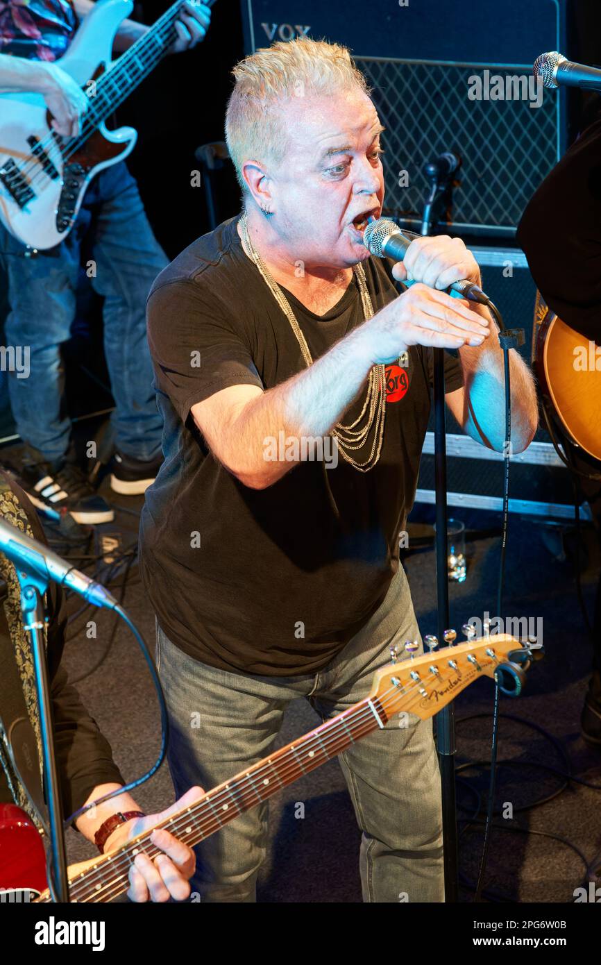 Punk producer and singer Mike Bennett performing with The Blockheads at ...