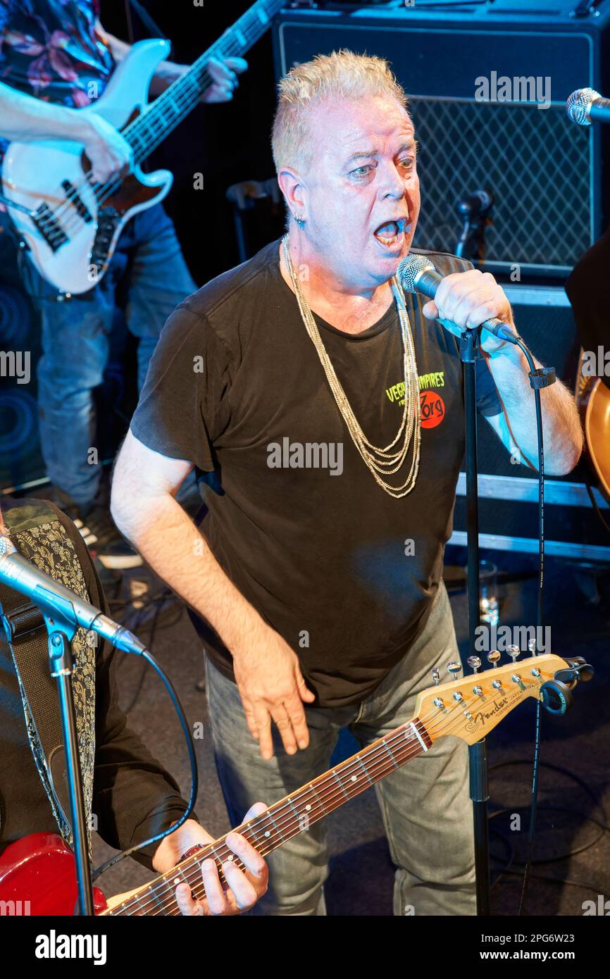 Punk producer and singer Mike Bennett performing with The Blockheads at ...