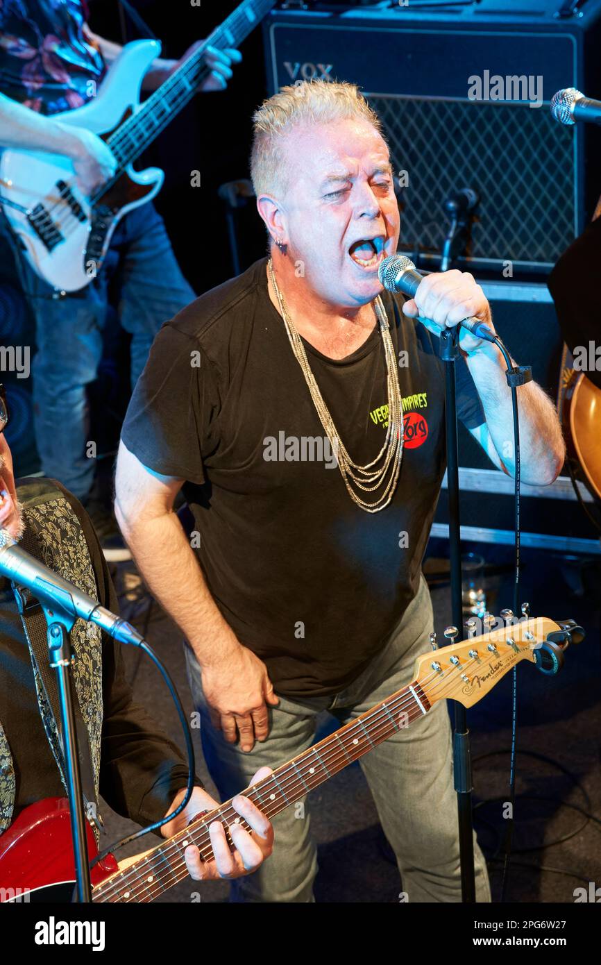 Punk producer and singer Mike Bennett performing with The Blockheads at ...