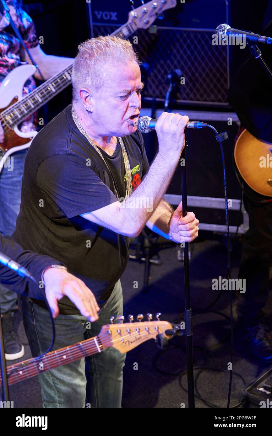 Punk producer and singer Mike Bennett performing with The Blockheads at ...