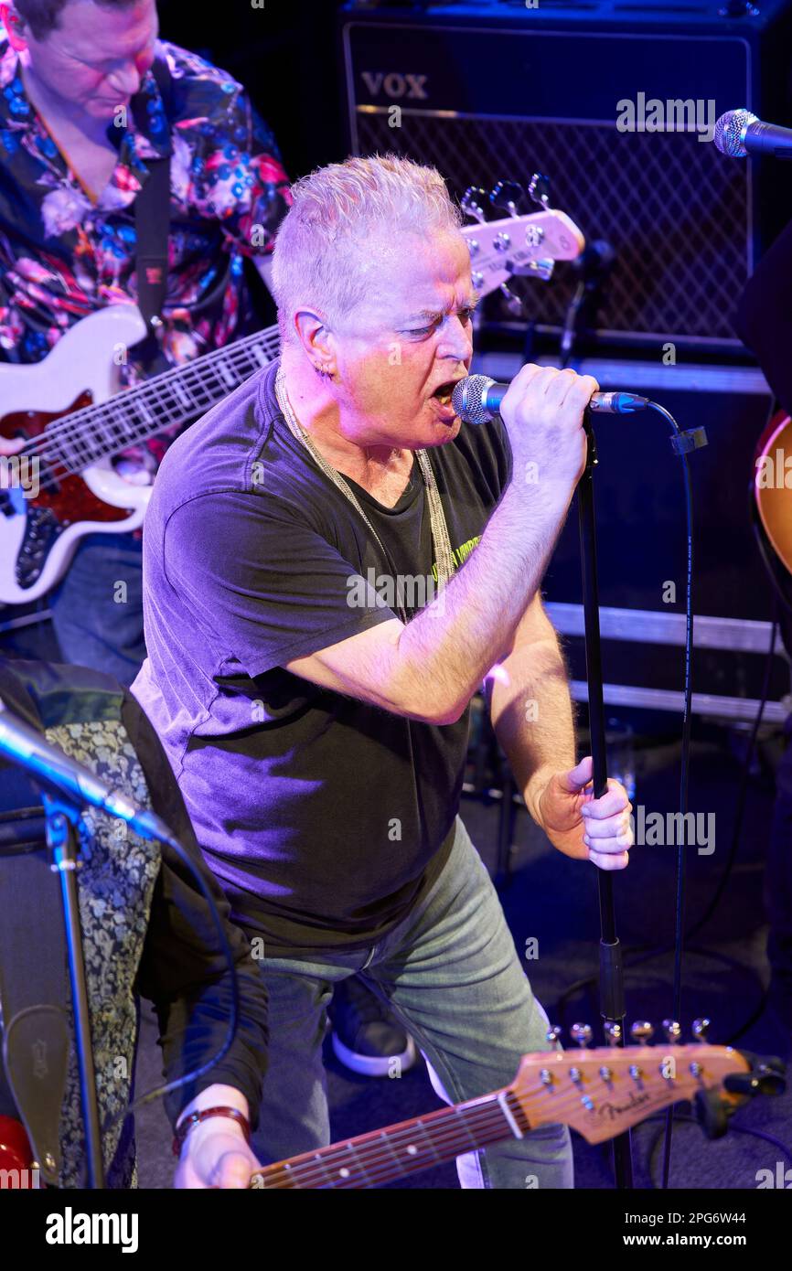 Punk producer and singer Mike Bennett performing with The Blockheads at ...