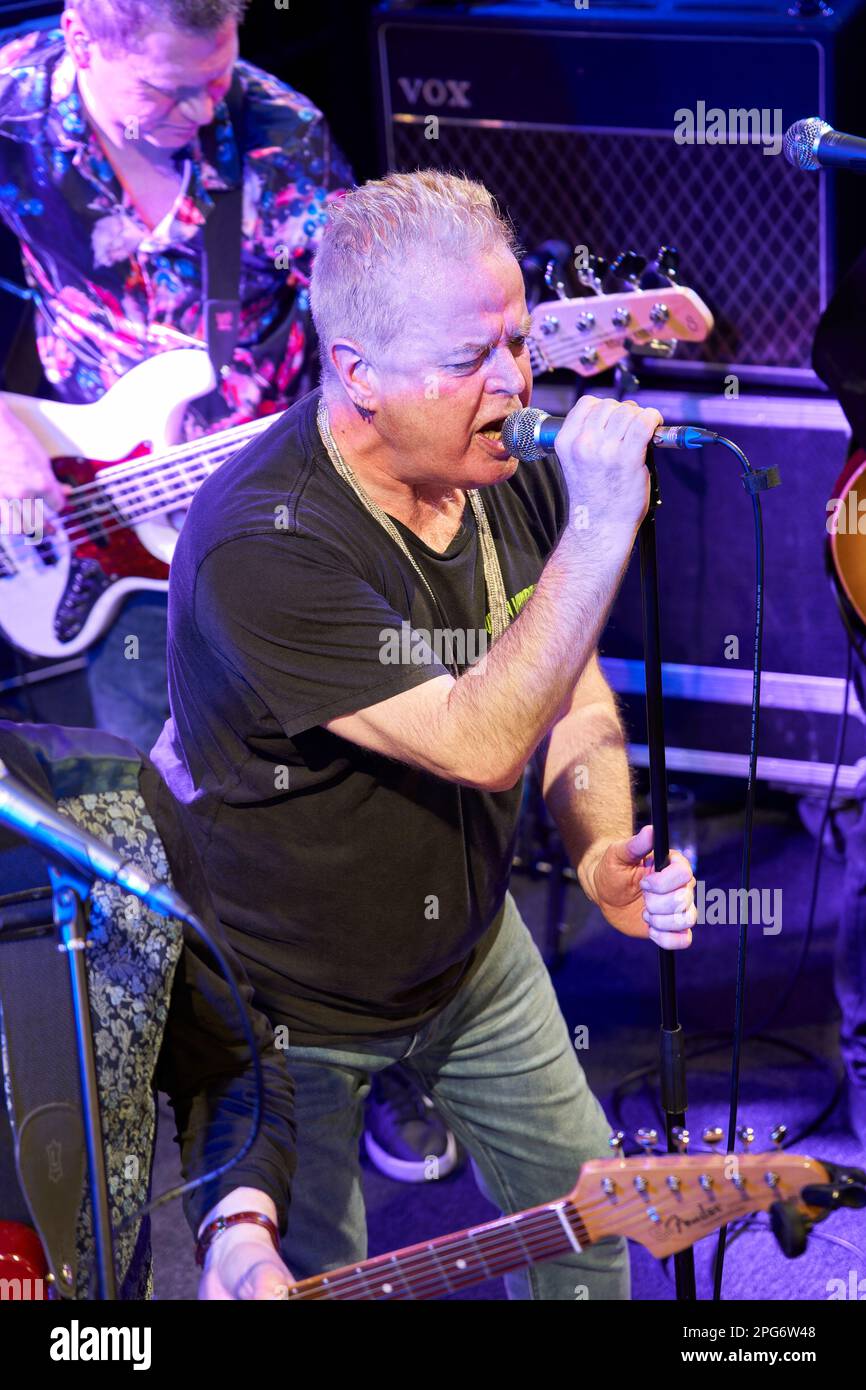 Punk producer and singer Mike Bennett performing with The Blockheads at ...