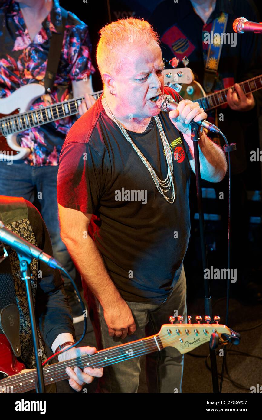 Punk producer and singer Mike Bennett performing with The Blockheads at ...