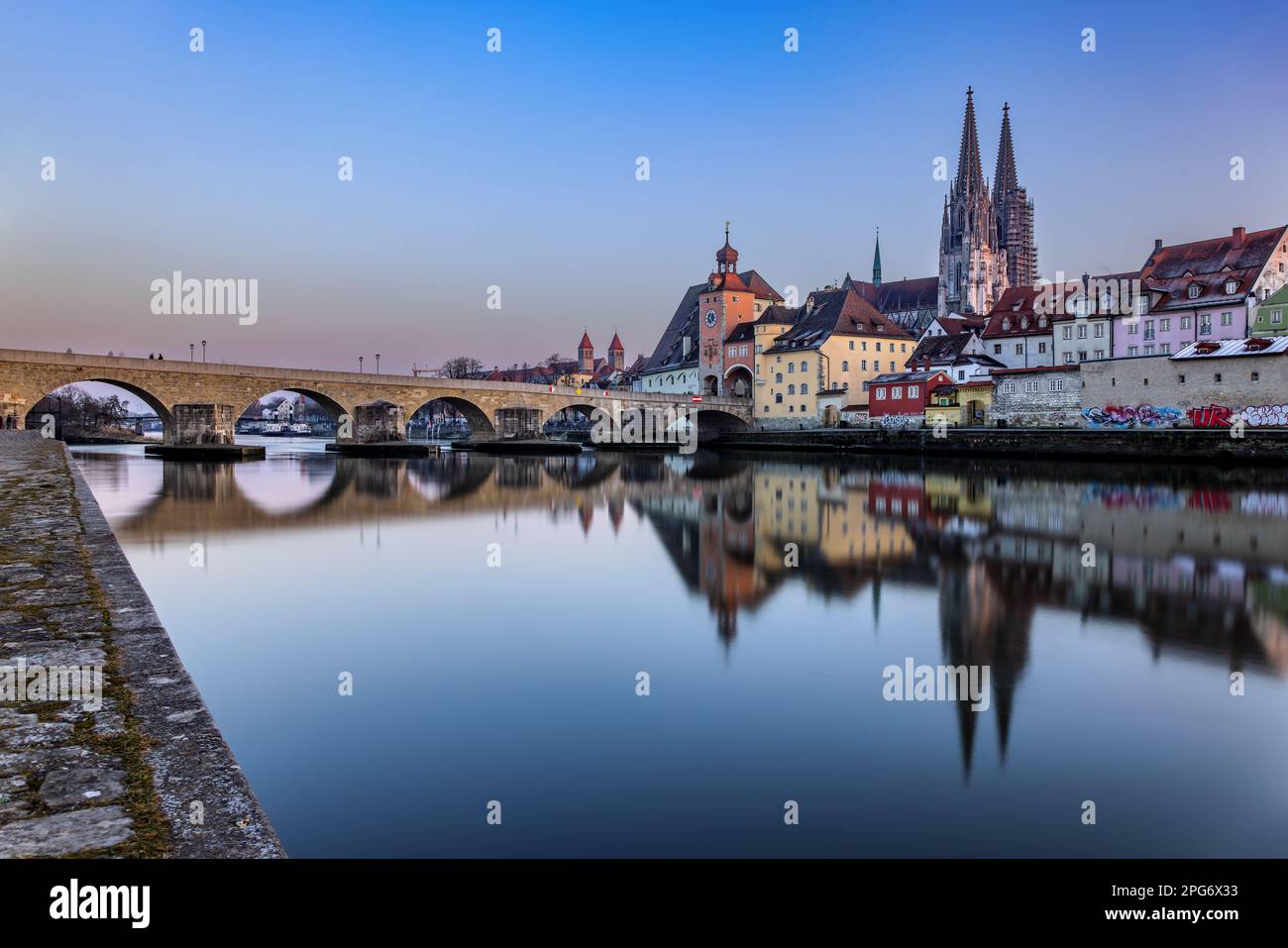 View over the Danube river towards the Regensburg cathedral and the ...