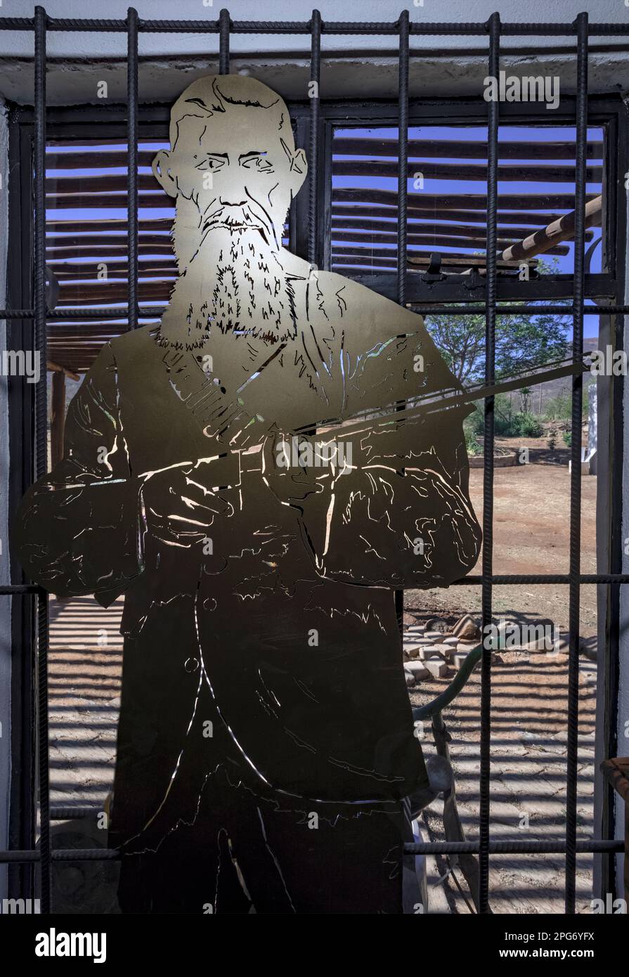 A metal portrait of a Boer farmer by Landman Marias stands behind the ...