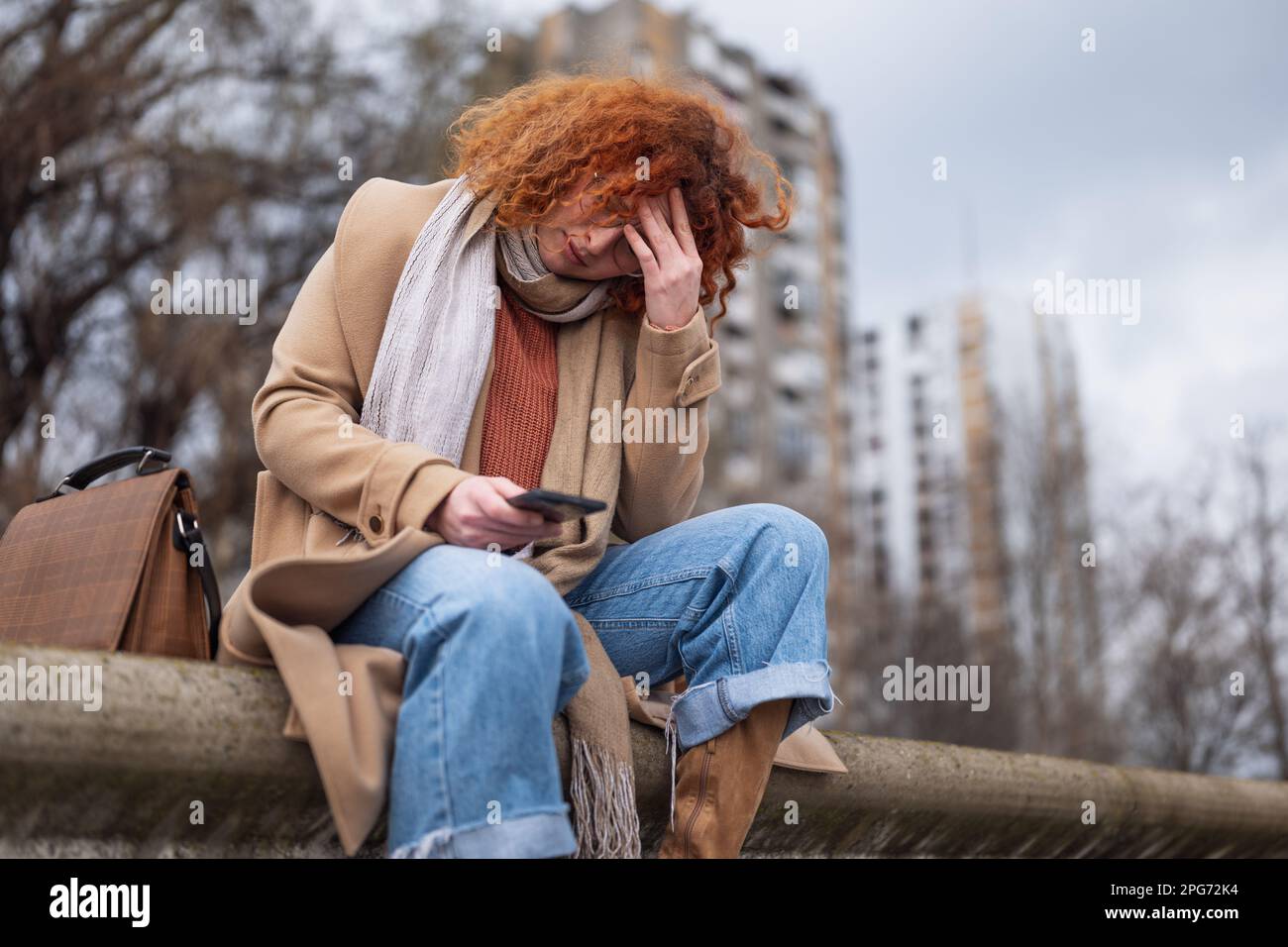 Pensive redhead curly young woman hi-res stock photography and images ...