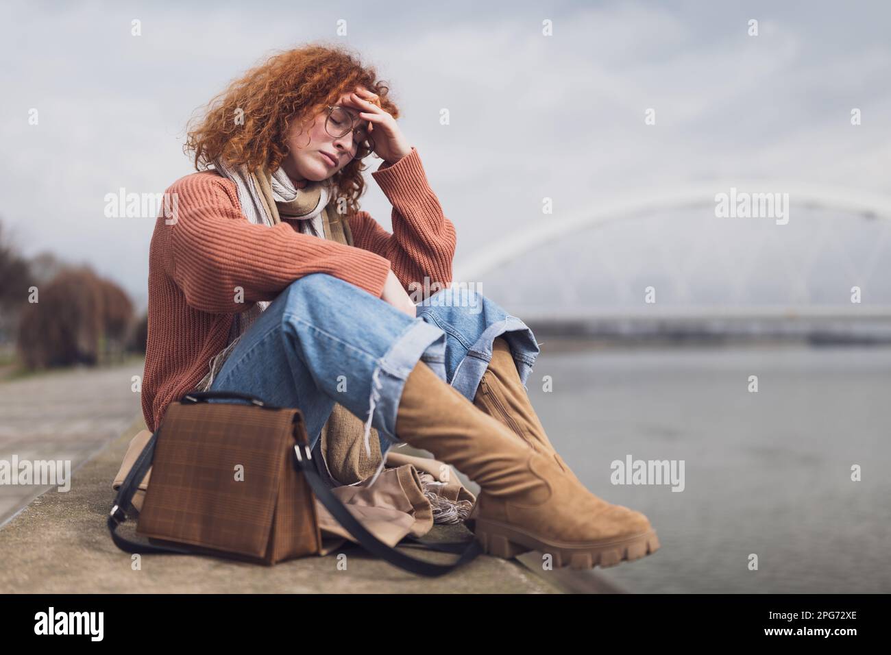 Pensive redhead curly young woman hi-res stock photography and images ...