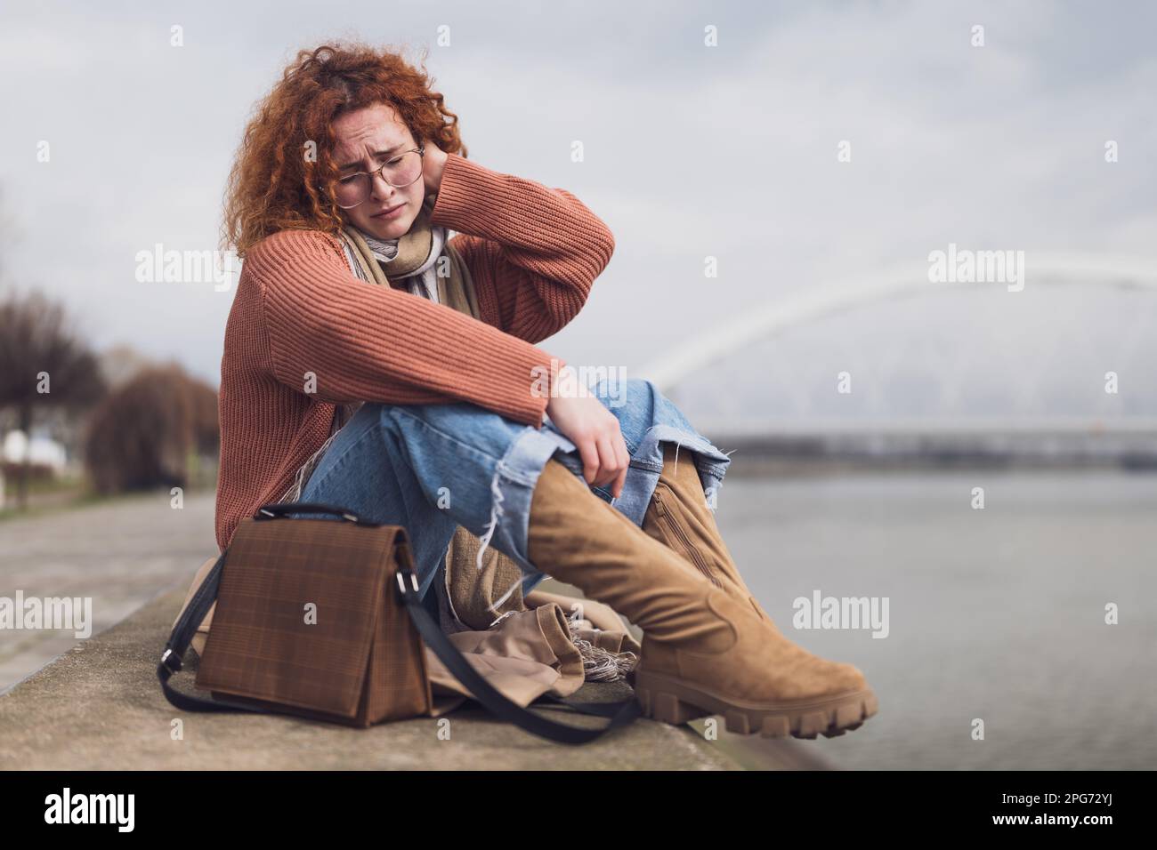 Natural portrait of a caucasian ginger woman with freckles and curly ...