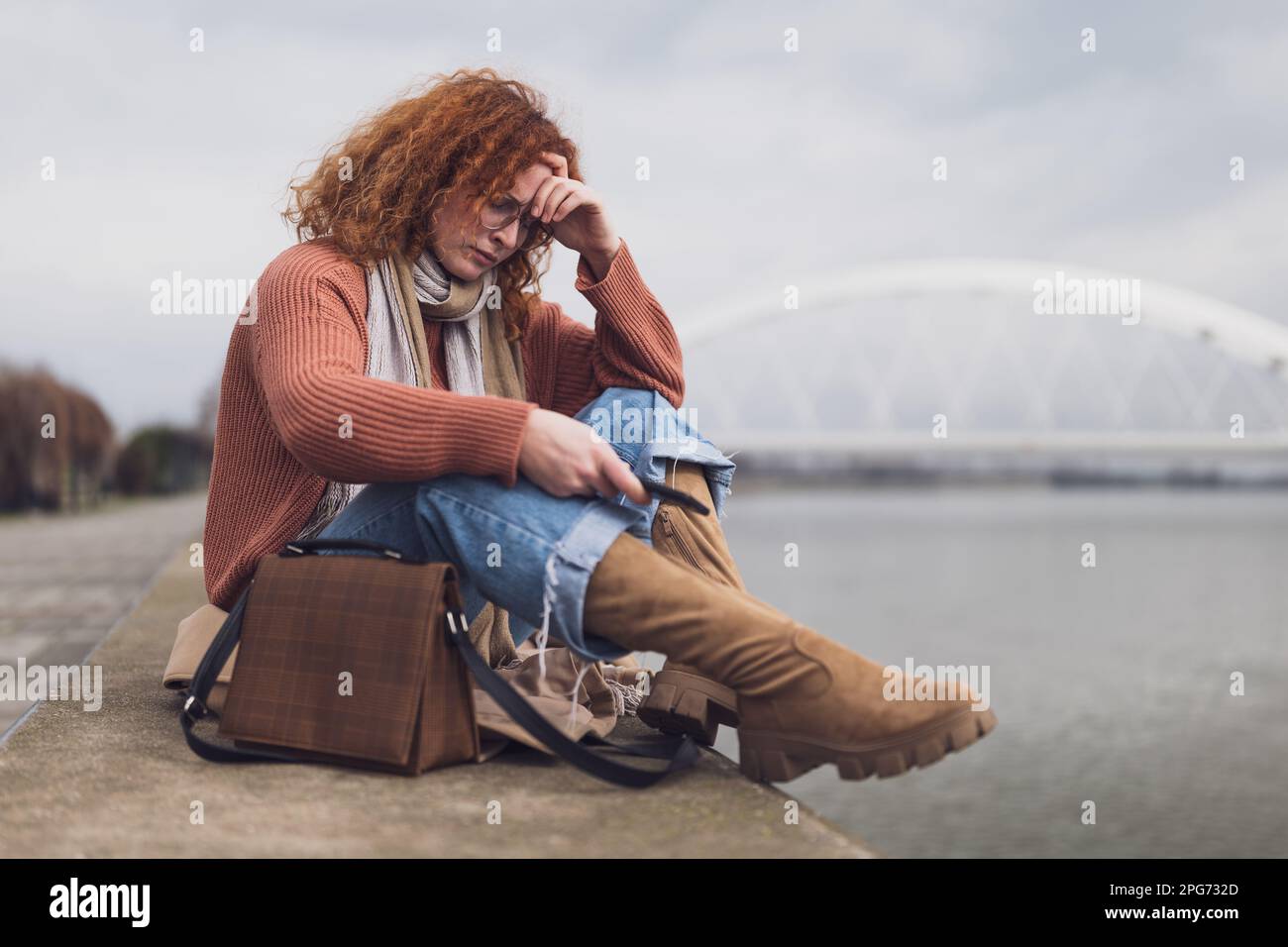 Natural portrait of a caucasian ginger woman with freckles and curly ...