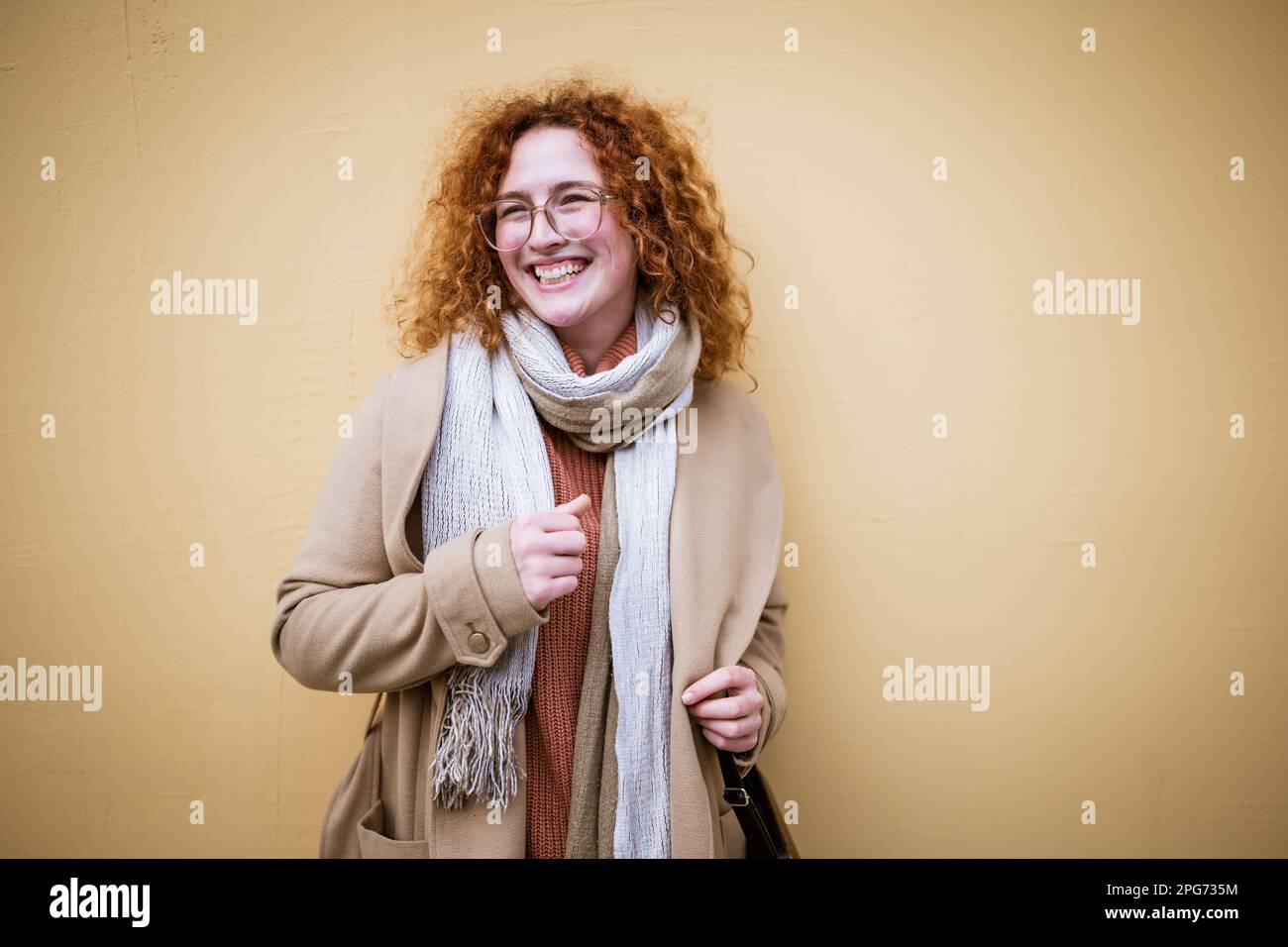 Natural portrait of smiling caucasian ginger woman with freckles and ...