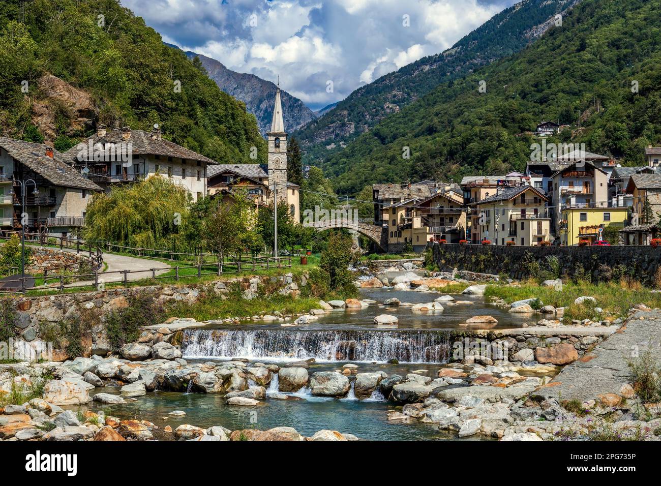 View of alpine river, small town of Fontainemrore and mountains in ... View of alpine river, small town of Fontainemrore and mountains in ...