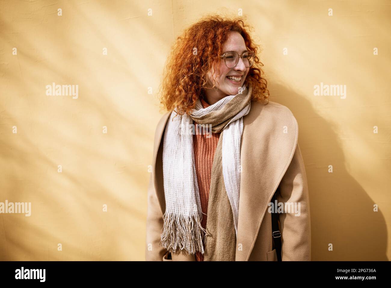 Natural portrait of smiling caucasian ginger woman with freckles and ...