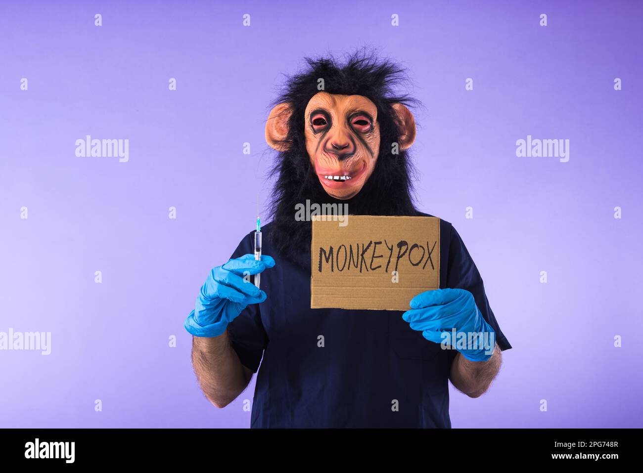 Person dressed in a monkey with a mask, with a medical nurse's suit ...