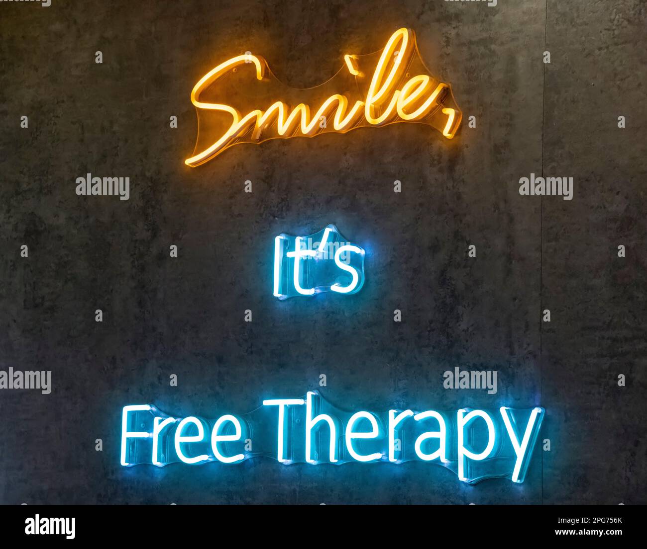 Neon sign with " Smile it's free Therapy", Hong Kong, China Stock Photo ...
