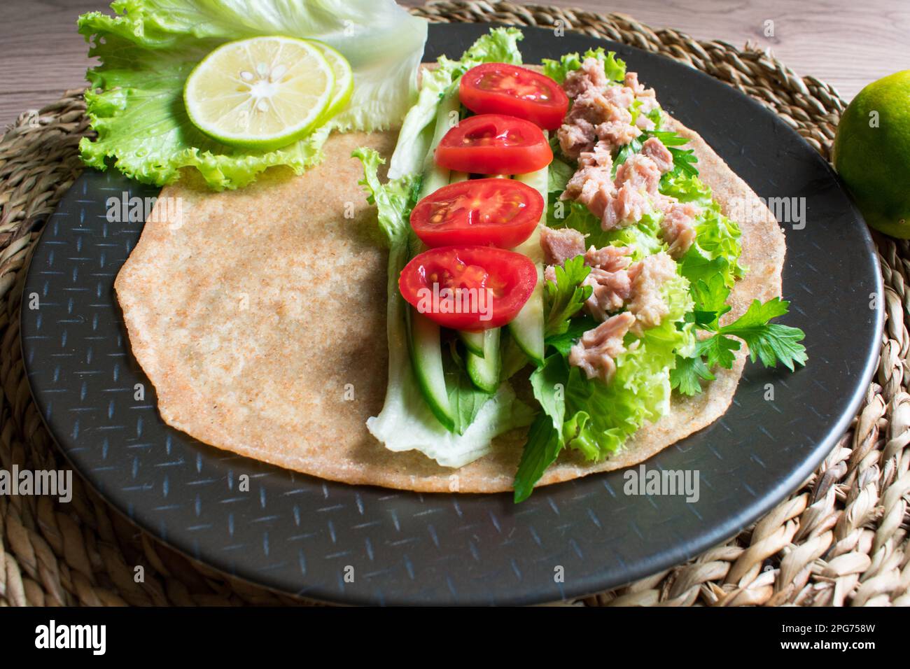 Delicious veggie tuna lavash, healthy eating with tuna, tomato ...