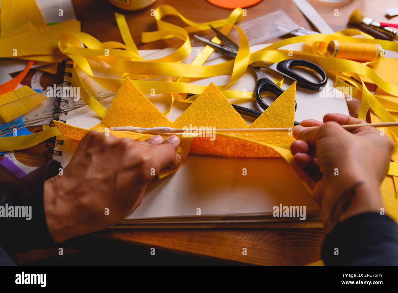 adult woman making homemade scrapbooking album from paper. DIY paper ...