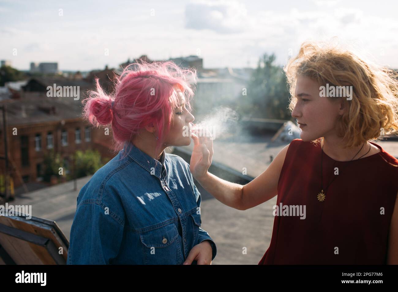 bad influence girl smoking street danger lifestyle Stock Photo - Alamy