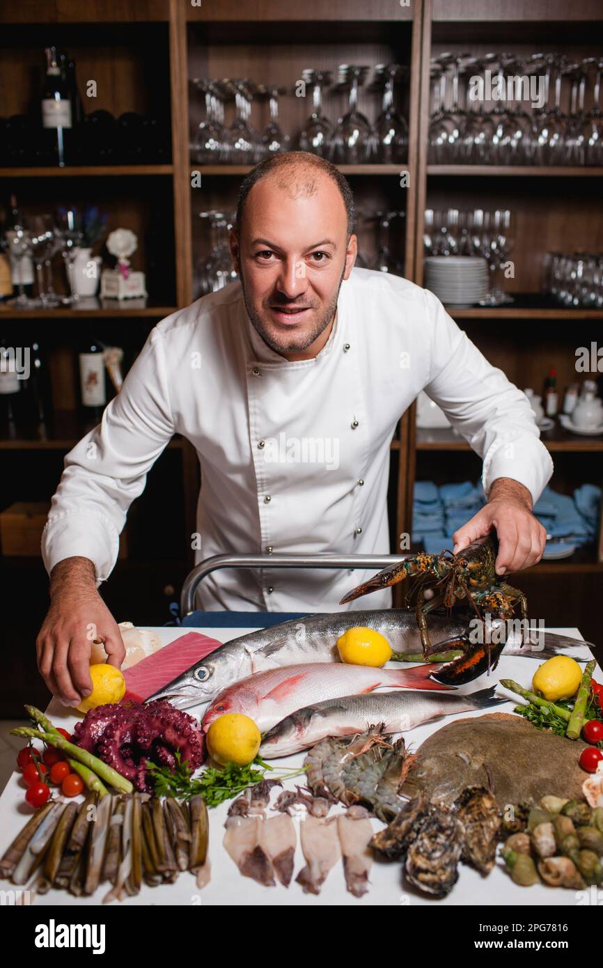 Chef seafood restaurant assortment concept Stock Photo - Alamy