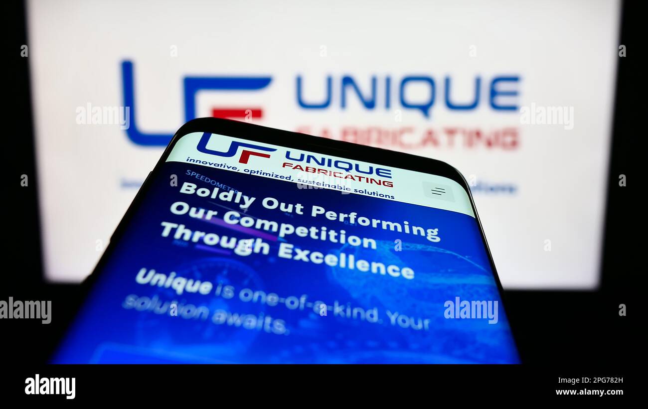 Mobile phone with website of US manufacturing company Unique ...