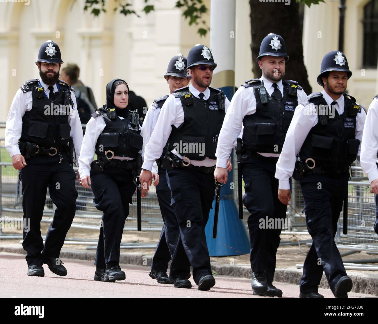 Pic shows: Police including a female muslim police officer guarding the ...