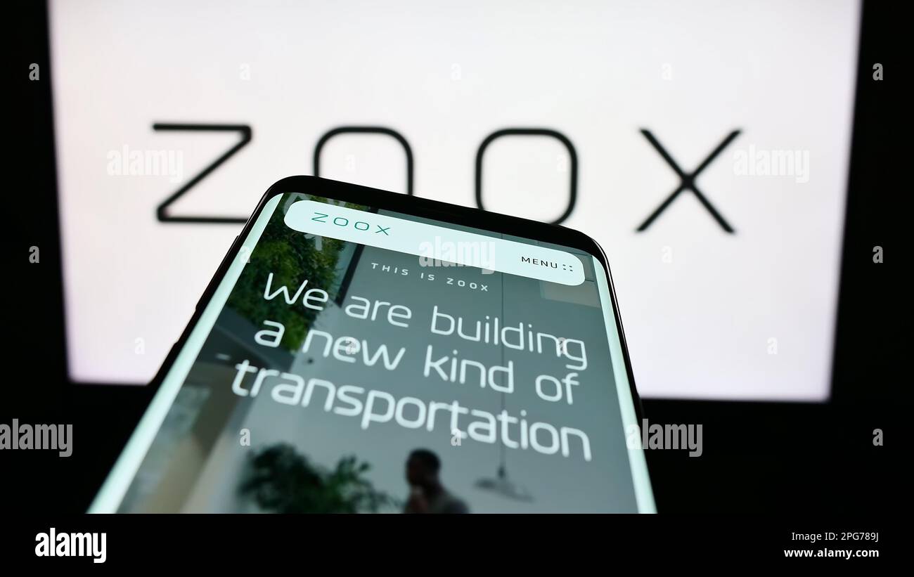 Mobile phone with webpage of US autonomous vehicle company Zoox Inc. on ...