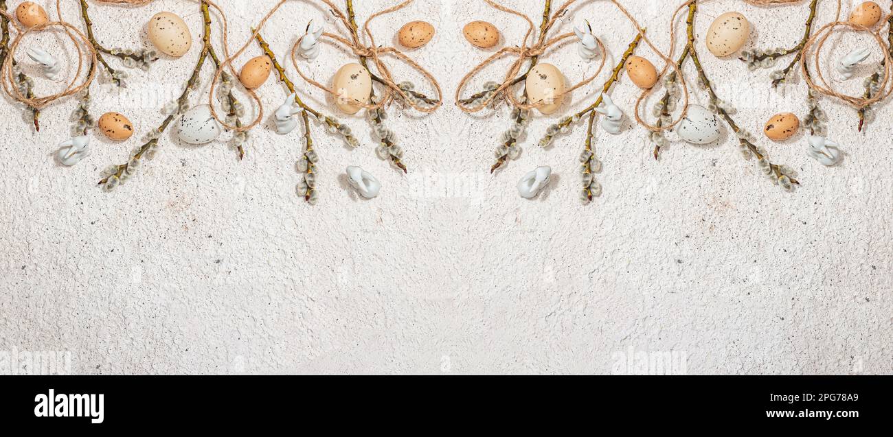 Festive Easter background with rabbit, willow, eggs and vintage thread ...