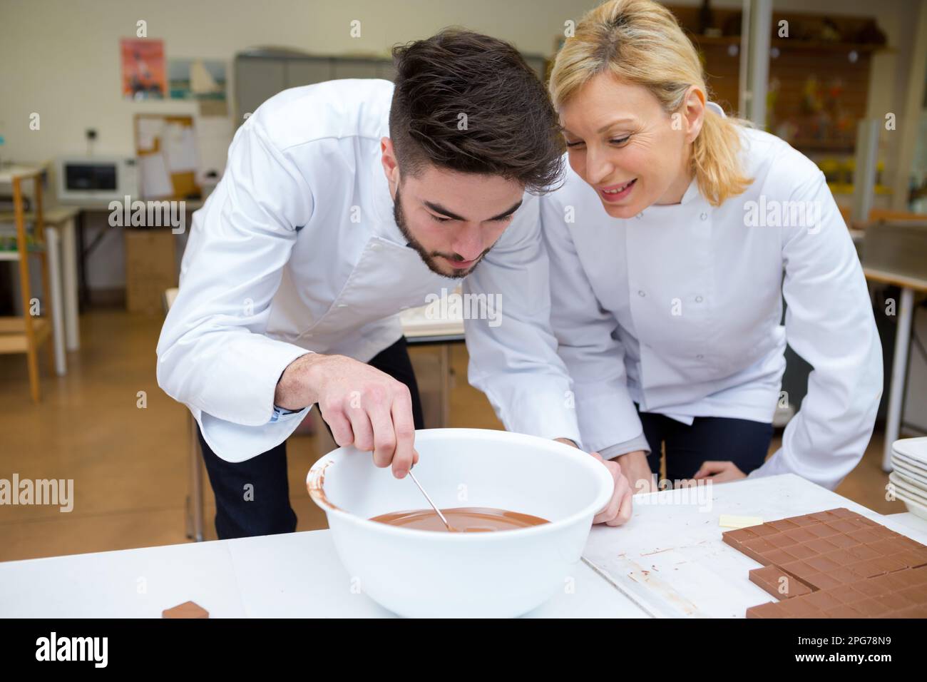 People making chocolate hi-res stock photography and images - Alamy