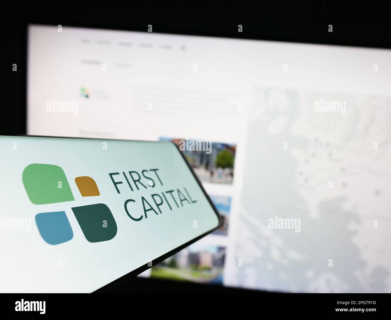 Smartphone with logo of Canadian real estate company First Capital REIT ...