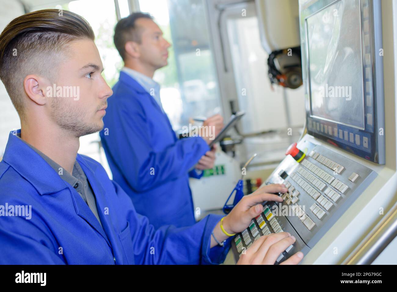 Men enter factory hi-res stock photography and images - Alamy