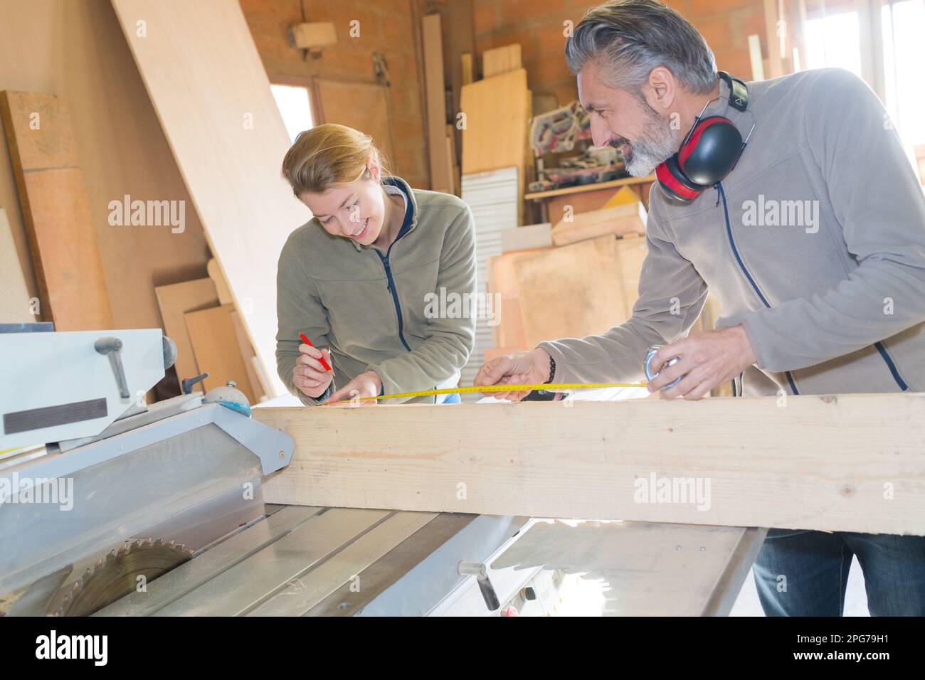 carpenter learning during measuring apprenticeships lesson Stock Photo ...