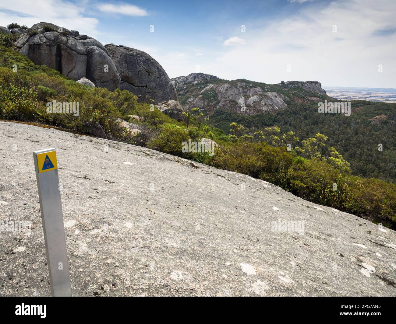 Track marker on granite slab below Hayward Peak on the Nancy Peak walk ...