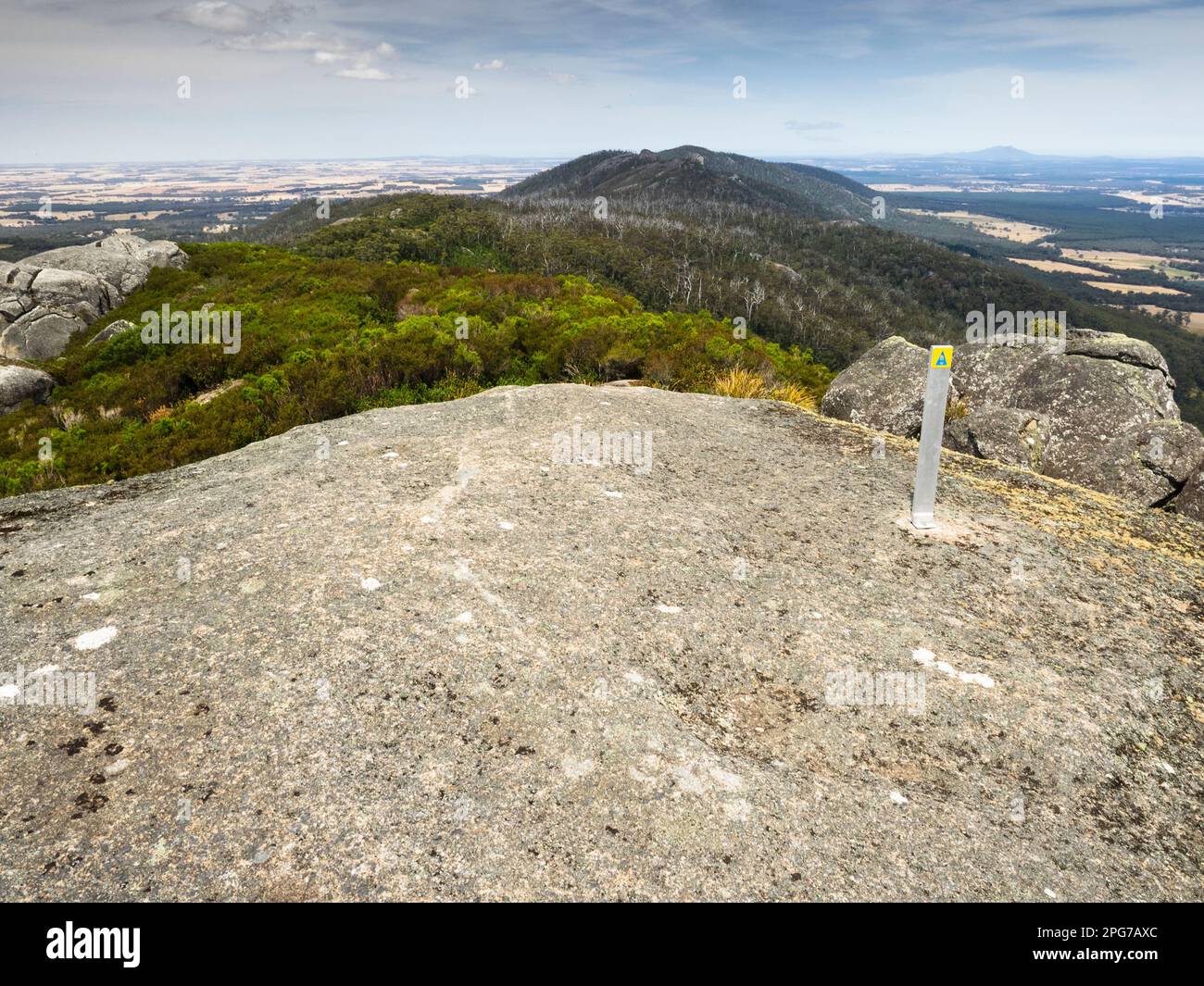 Track marker on granite slab on Hayward Peak on the Nancy Peak walk ...