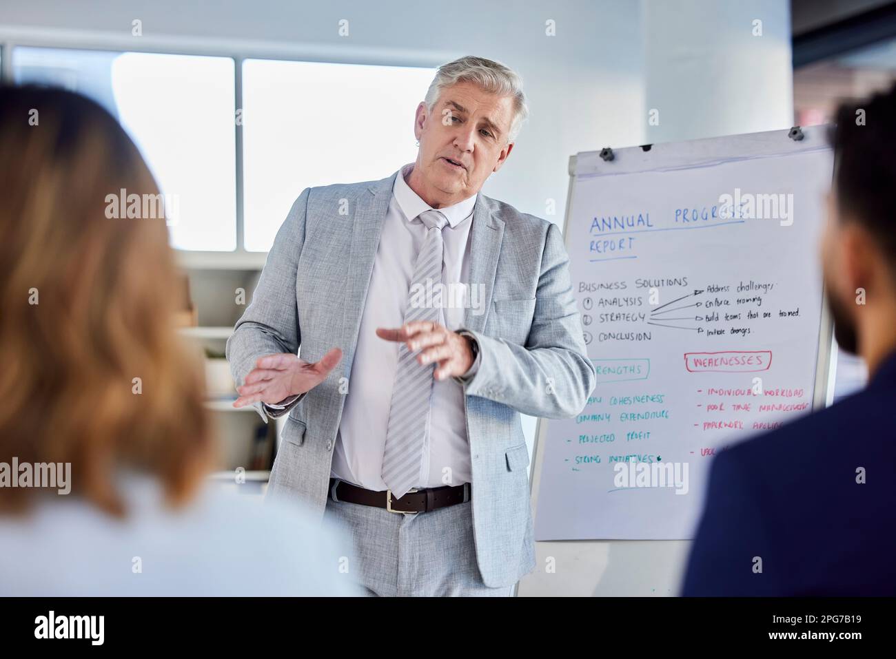 Senior businessman, presentation and meeting for staff training ...