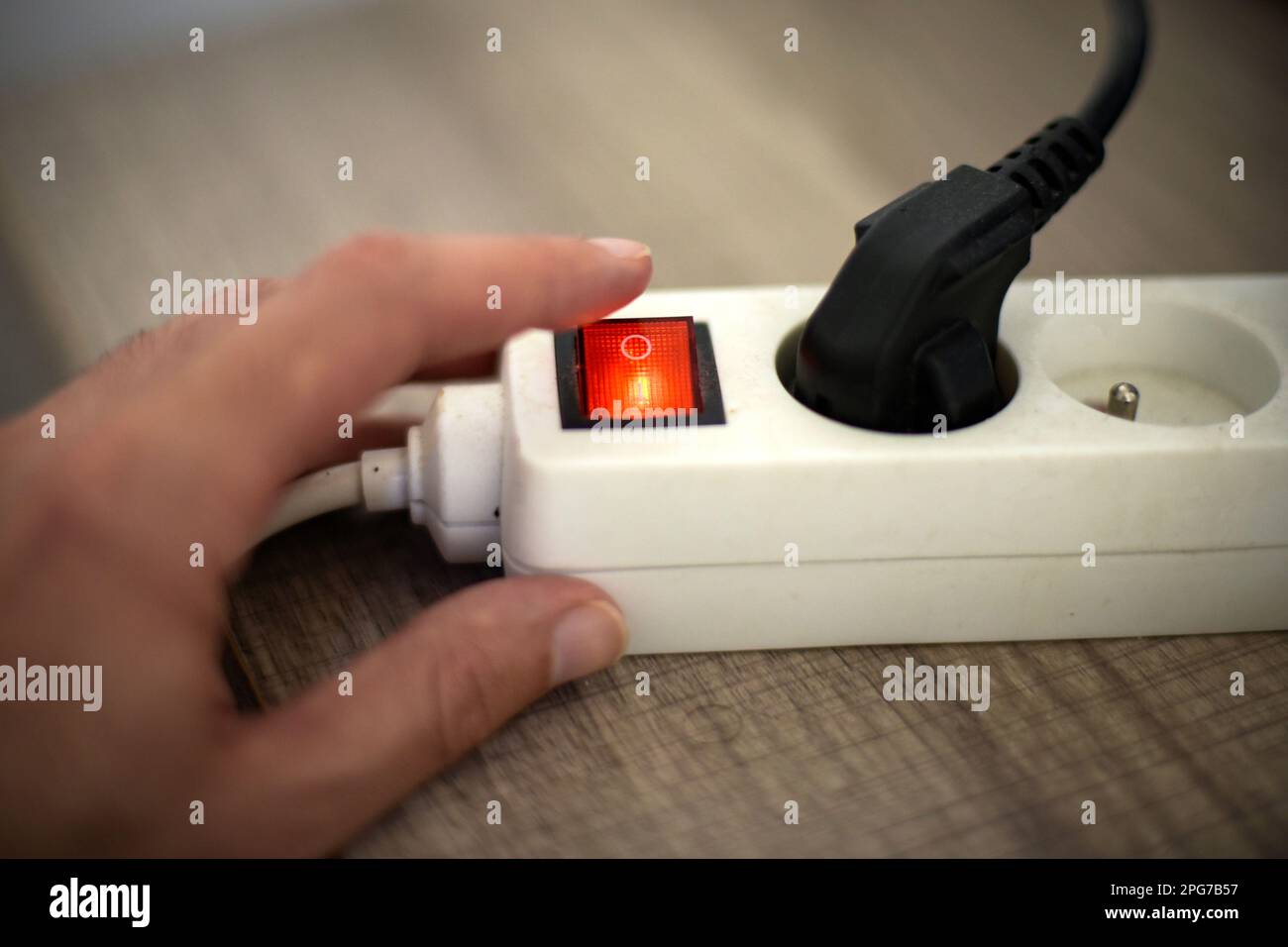 view of an electricity socket switch turned on at home Stock Photo - Alamy