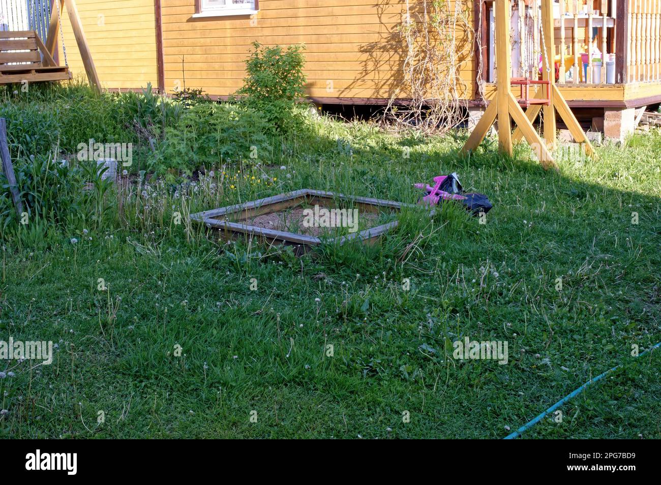 small sandbox in the courtyard of a village house, Russia Stock Photo ...