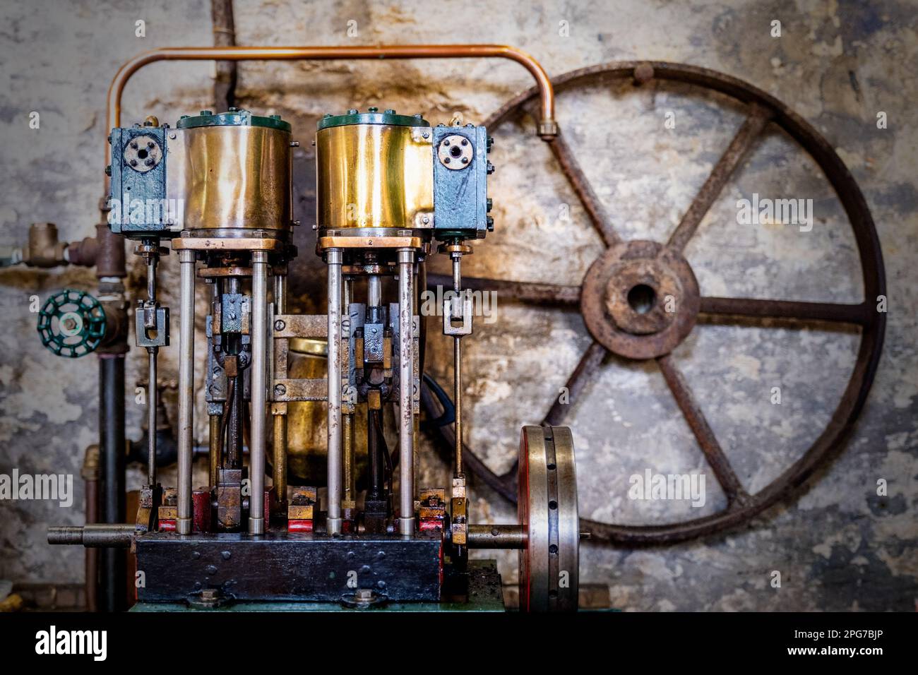 An antiquated machine equipped with three large metallic valves, along ...