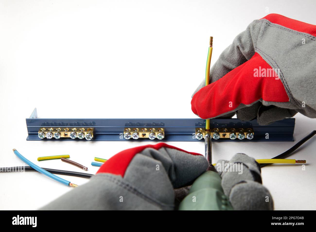 Installation electrical wire with terminal block. Electrician in ...