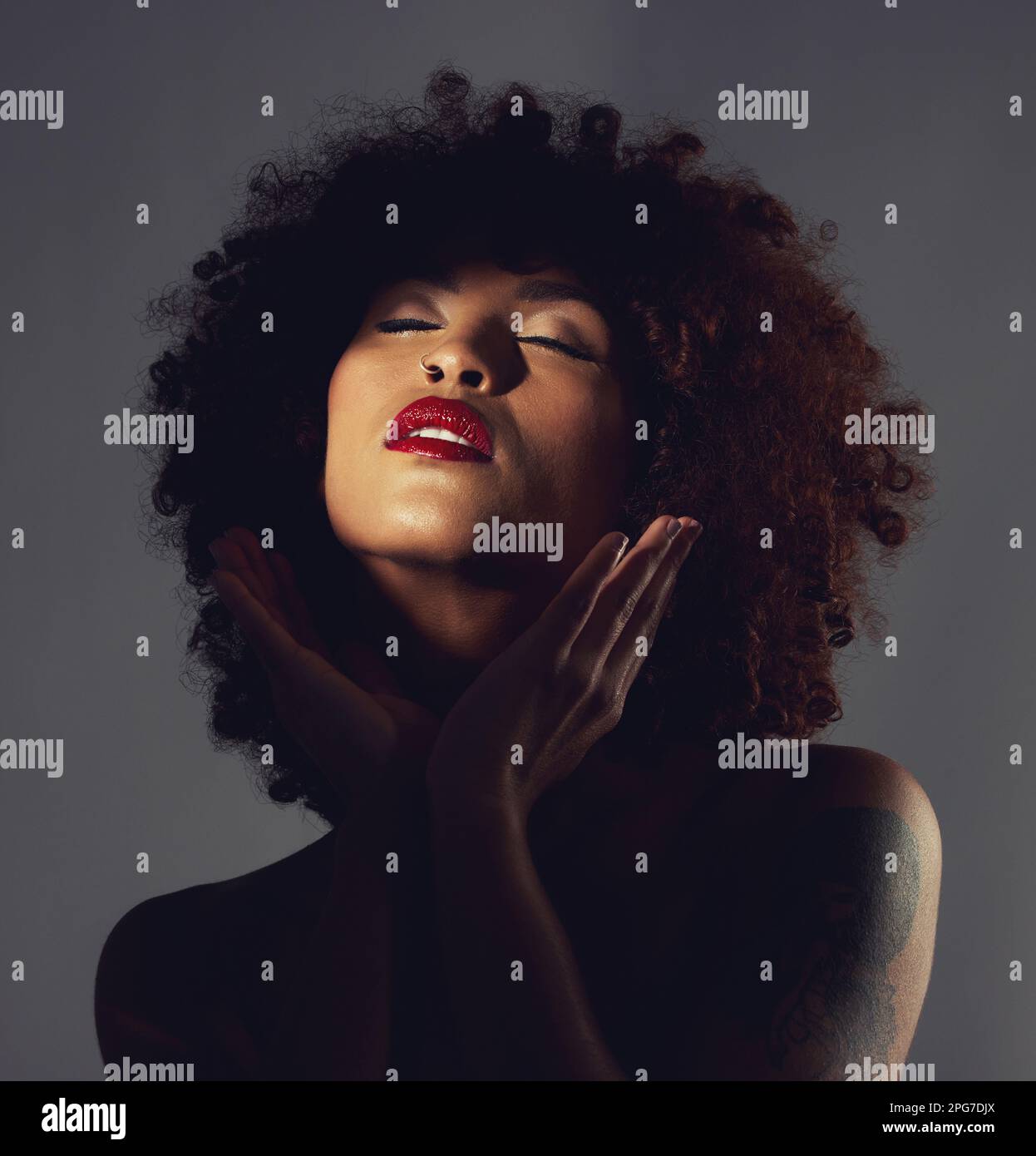 Black woman, shadow and makeup or red lipstick with beauty, afro or ...