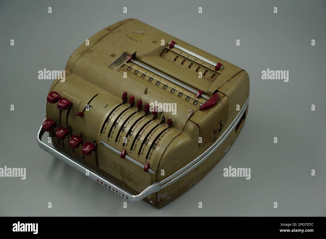 An antique mechanical calculator for counting funds Stock Photo - Alamy