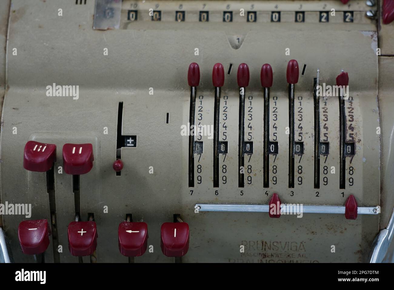 An antique mechanical calculator for counting funds Stock Photo - Alamy