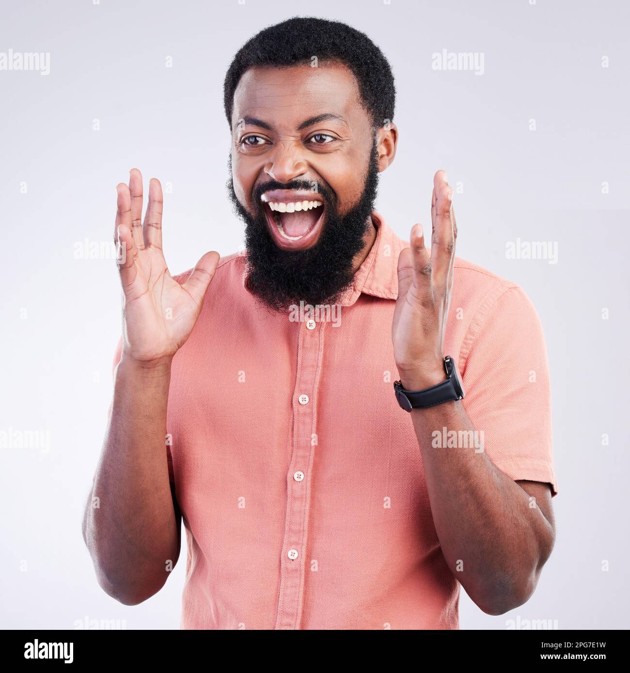 Screaming, surprise and cheering with black man in studio for shocked ...