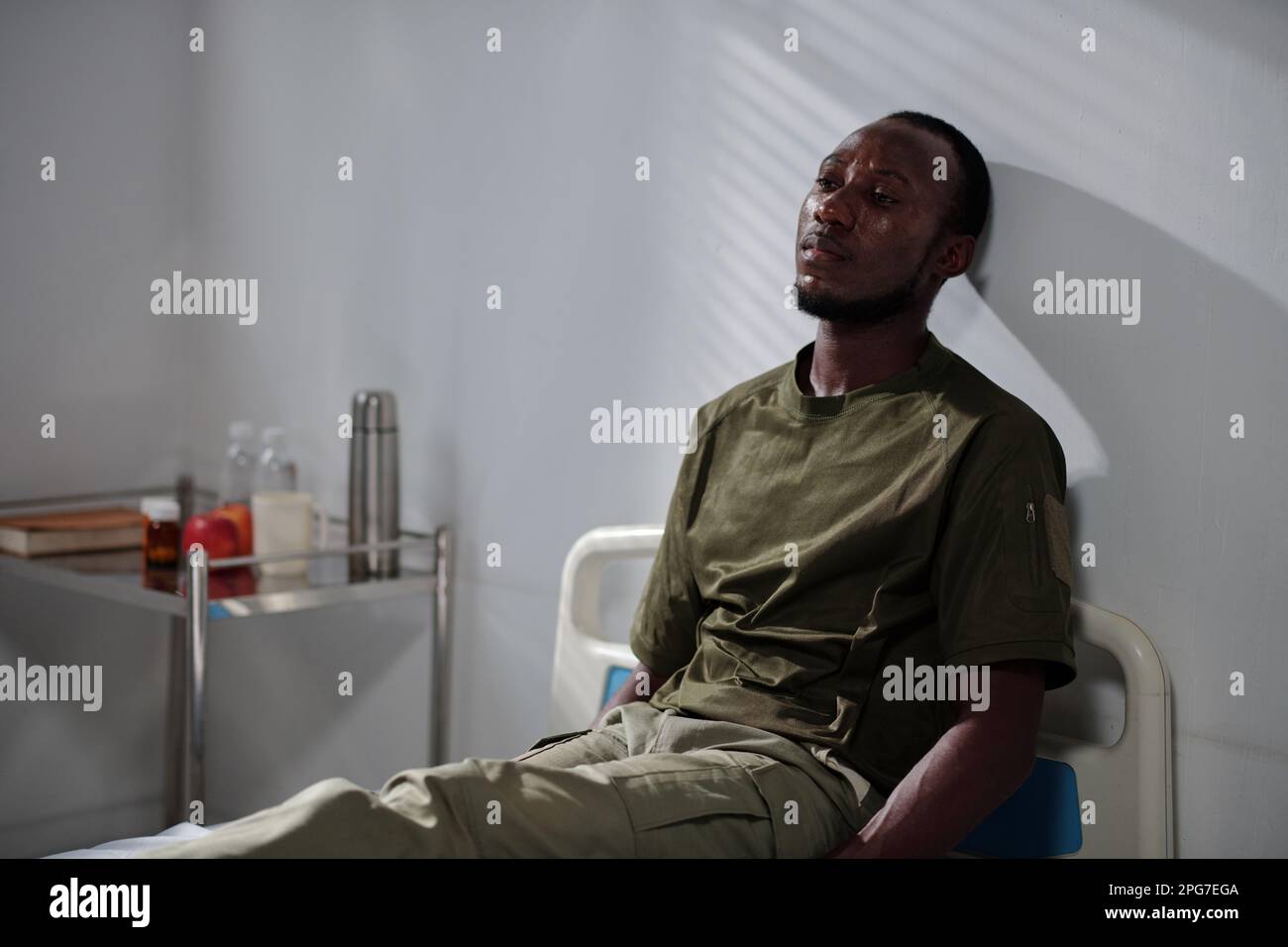 Soldier lying on bed hi-res stock photography and images - Alamy